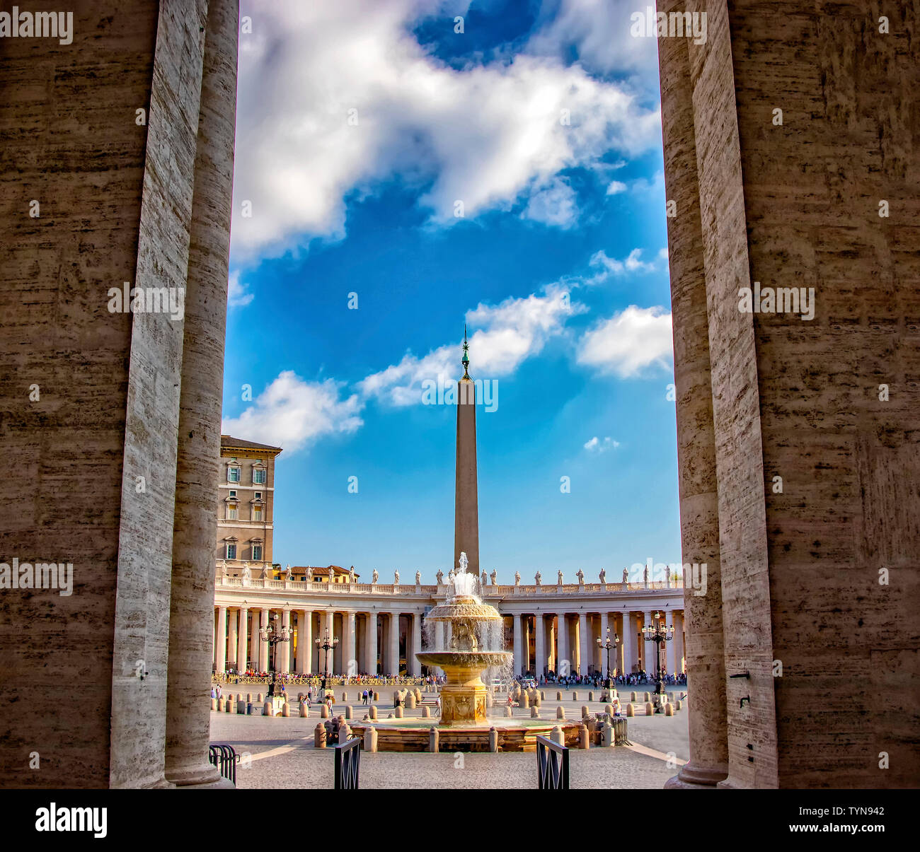 View of the fountain and pillar on the square in Vatican, Italy. There ...