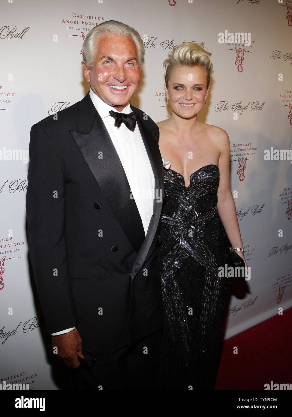 George Hamilton arrives on the red carpet at the Gabrielle's Angel ...