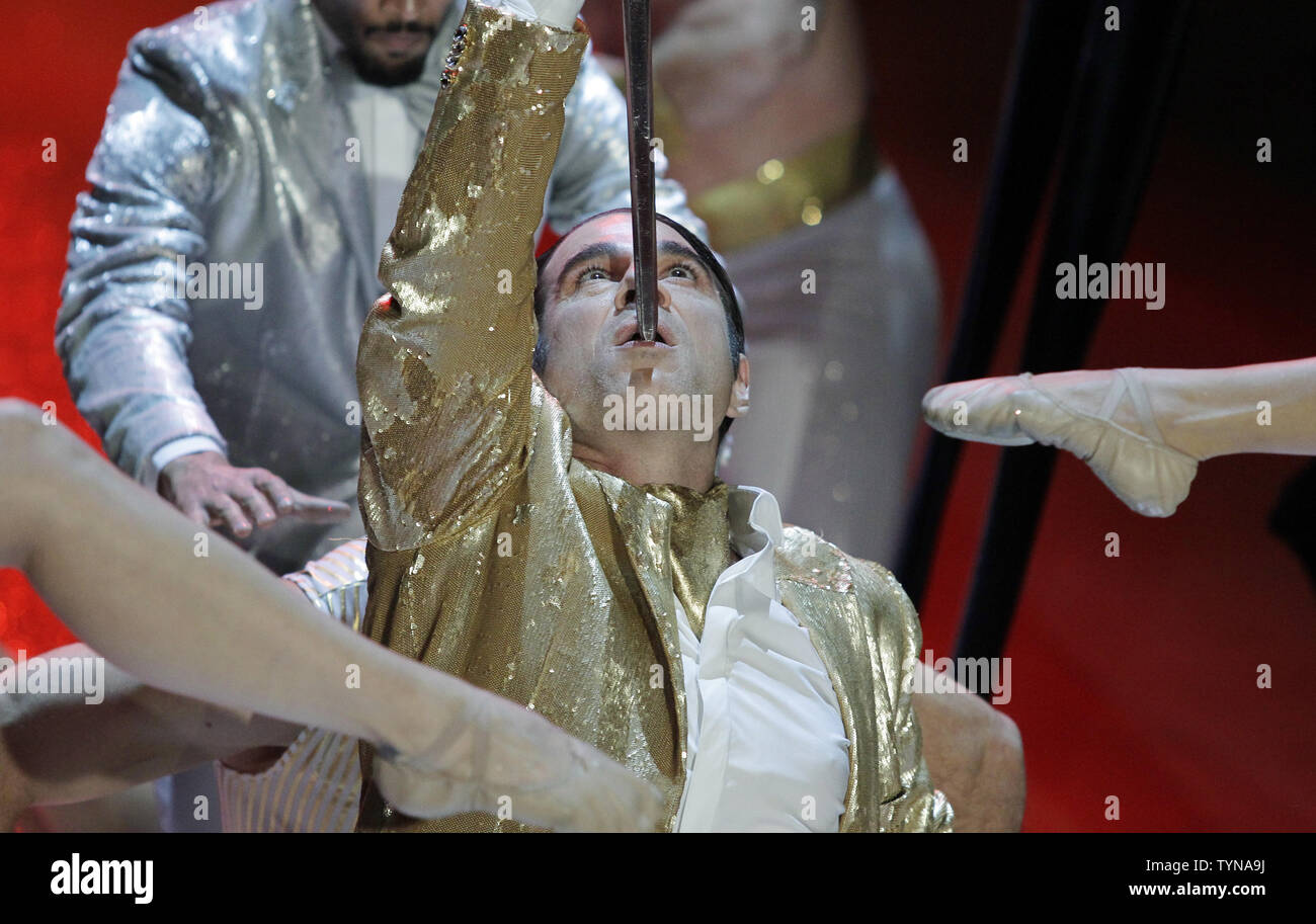 Circus acts take place on the runway a the start of the Victoria's ...