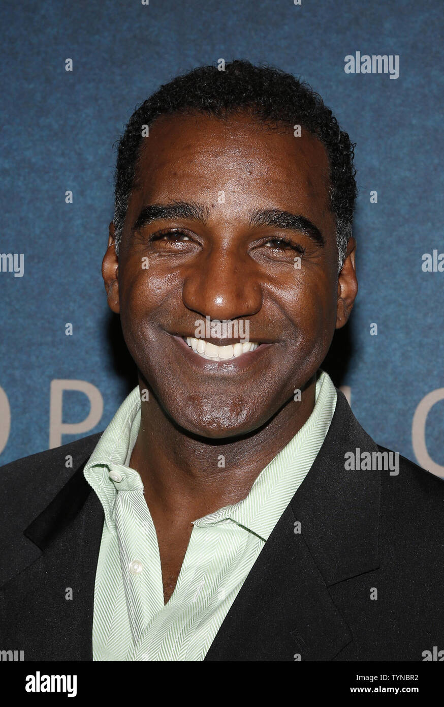 Norm Lewis arrives on the red carpet at the 'Les Miserables' premiere ...
