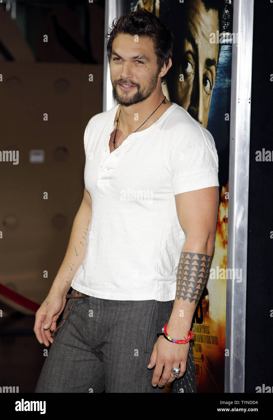 Jason Momoa arrives on the red carpet at the Bullet to the Head ...