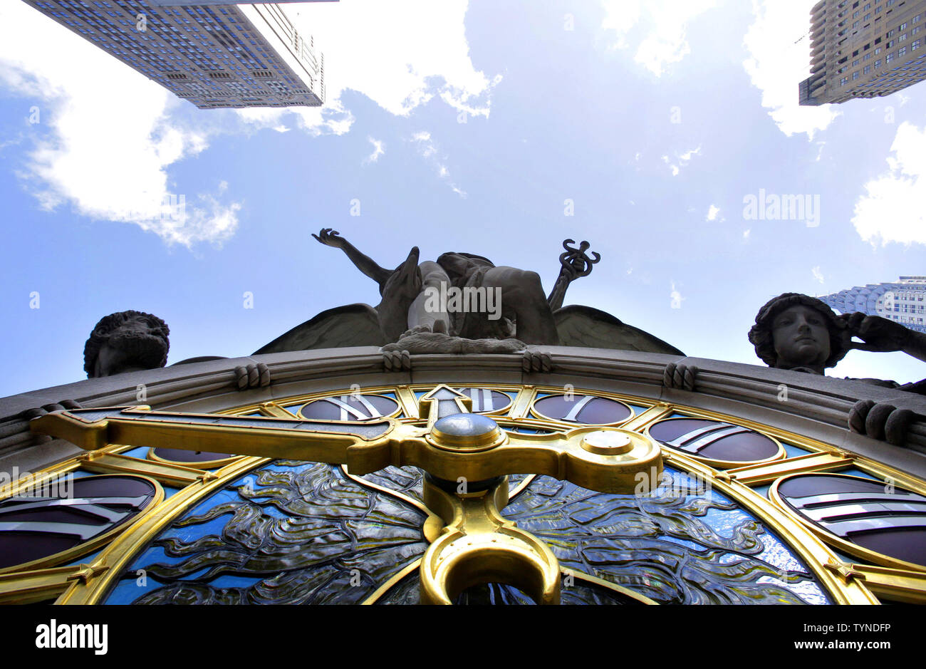 The Chrysler Building (R) can be seen above the giant and still ...