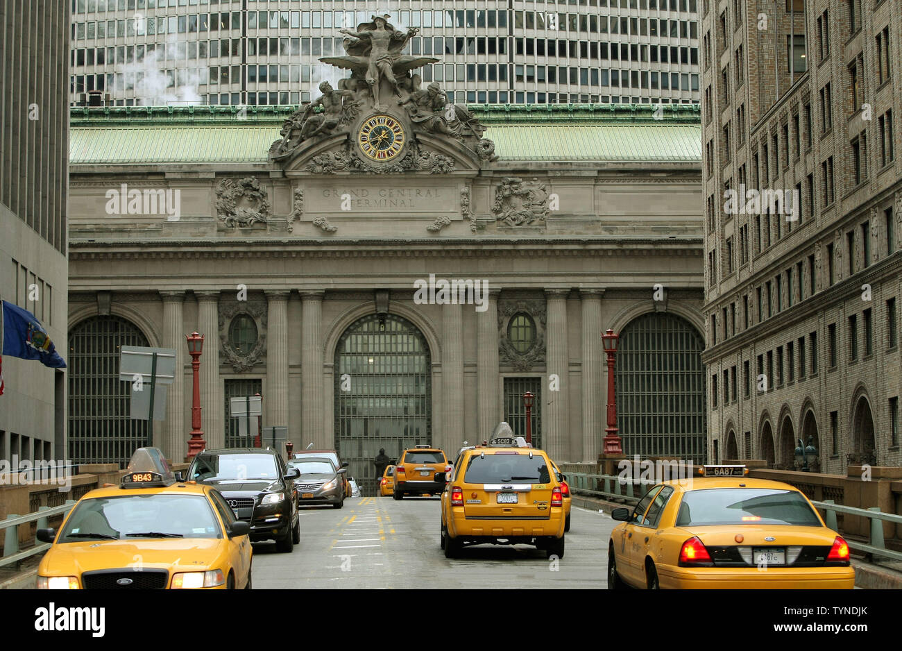 Cabs drive around Grand Central Station as the100th birthday of the ...
