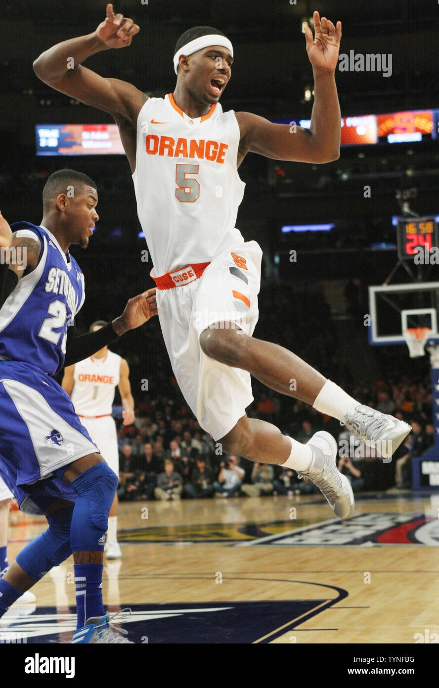 Syracuse's C.J.Fair reacts after losing grip of the ball as his team ...