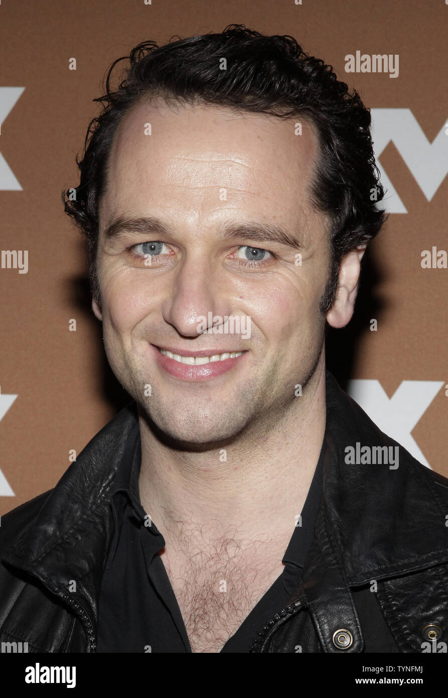 Matthew Rhys arrives on the red carpet at the 2013 FX Upfronts at Lucky ...