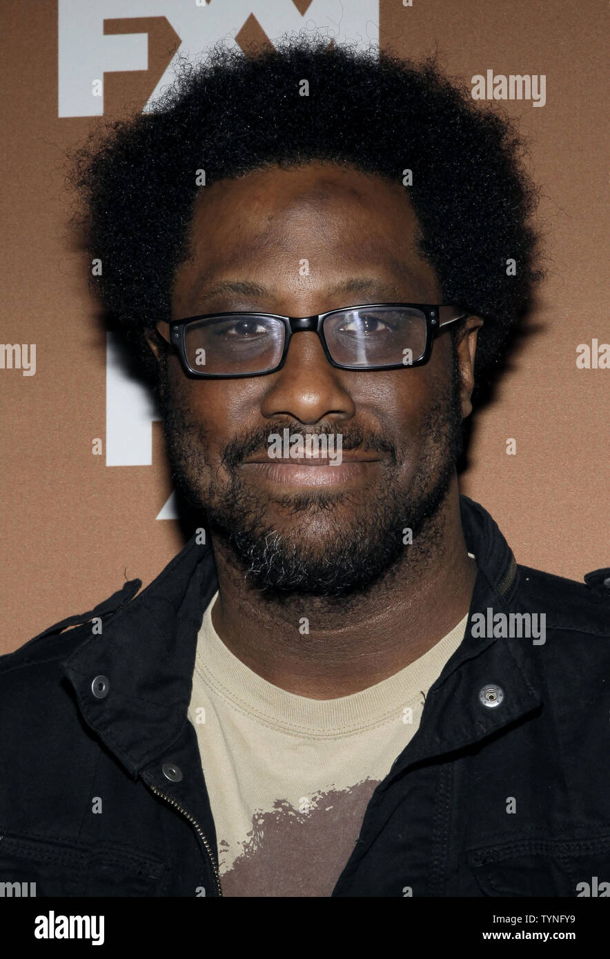 W. Kamau Bell arrives on the red carpet at the 2013 FX Upfronts at ...