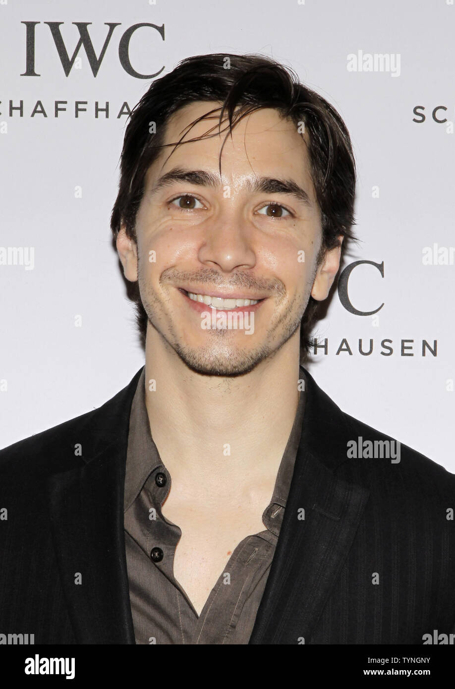 Justin Long arrives on the red carpet at the IWC/Tribeca Film Festival ...