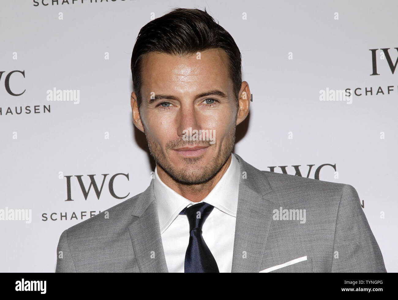 Alex Lundqvis arrives on the red carpet at the IWC/Tribeca Film ...