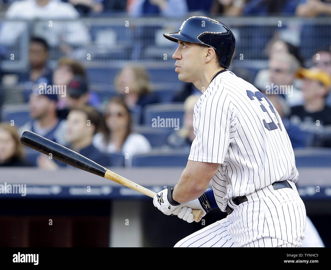 New York Yankees Travis Hafner hits an RBI triple in the seventh inning ...