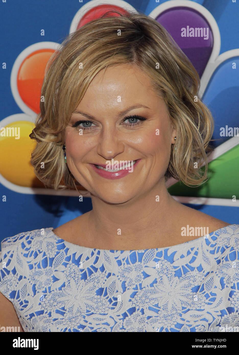 Amy Poehler arrives on the red carpet at the 2013 NBC Upfront ...