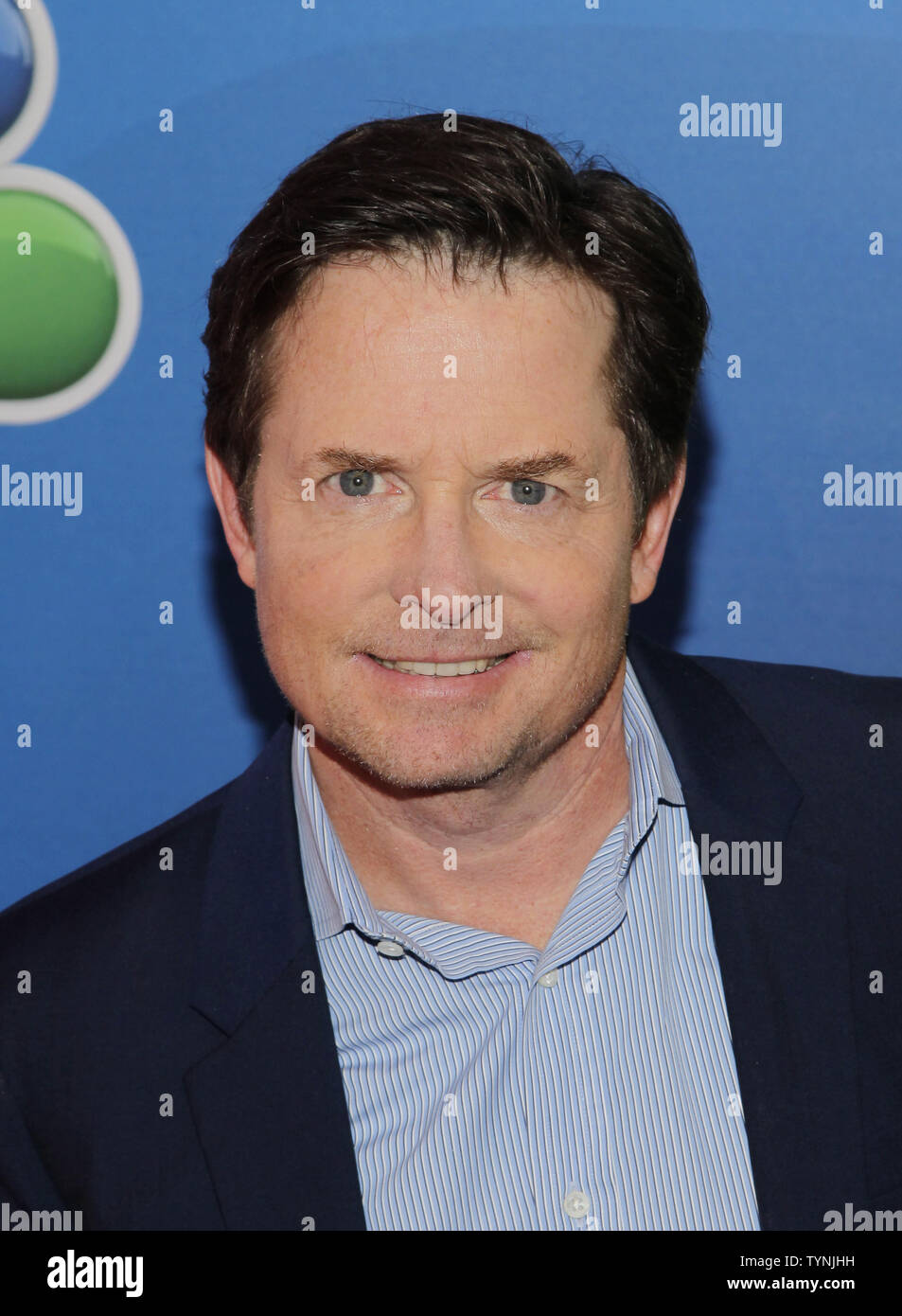 Michael J. Fox arrives on the red carpet at the 2013 NBC Upfront ...