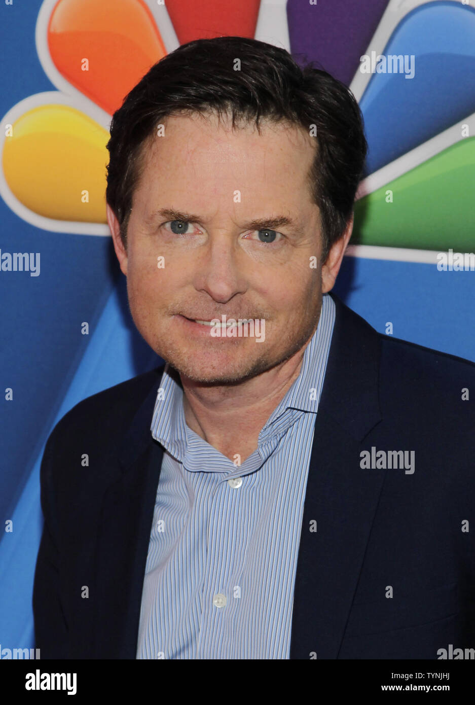 Michael J. Fox arrives on the red carpet at the 2013 NBC Upfront ...