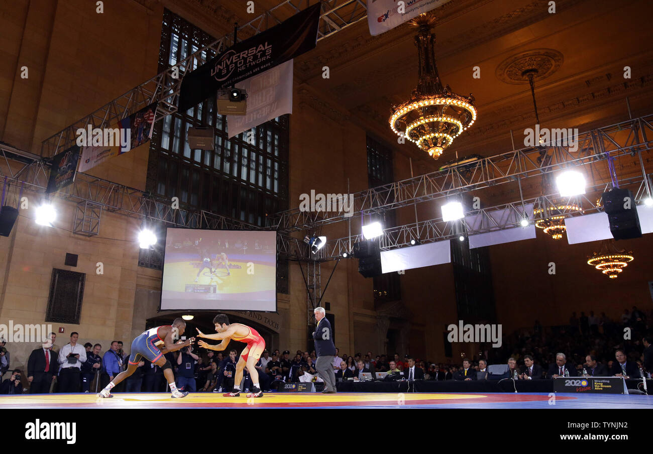 Obe Blanc of the United States and Hassan Rahimi of Iran compete in an ...