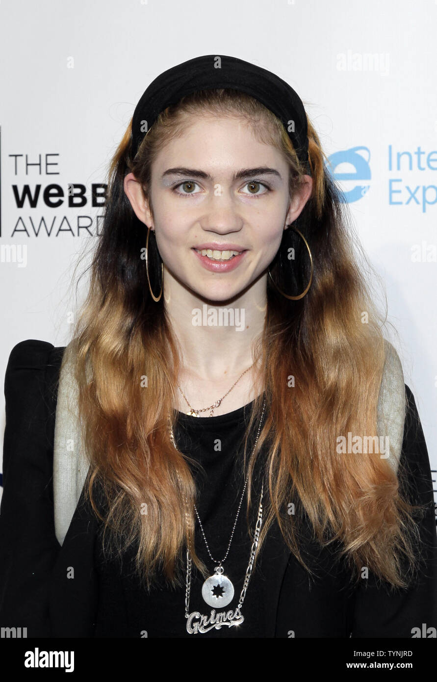 Grimes arrives on the red carpet the 17th Annual Webby Awards at ...