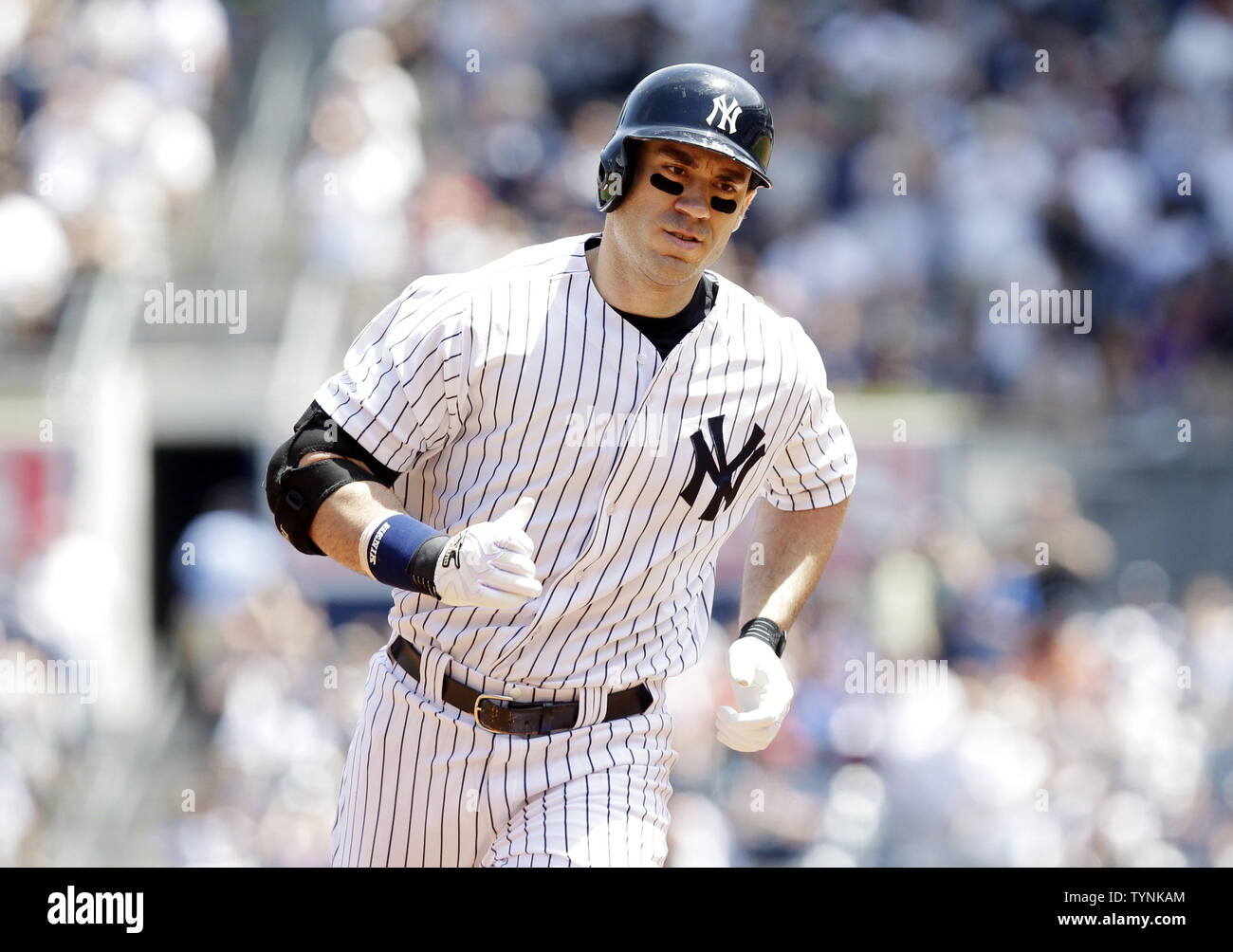 New York Yankees Travis Hafner runs the basses after hitting a 2-run ...