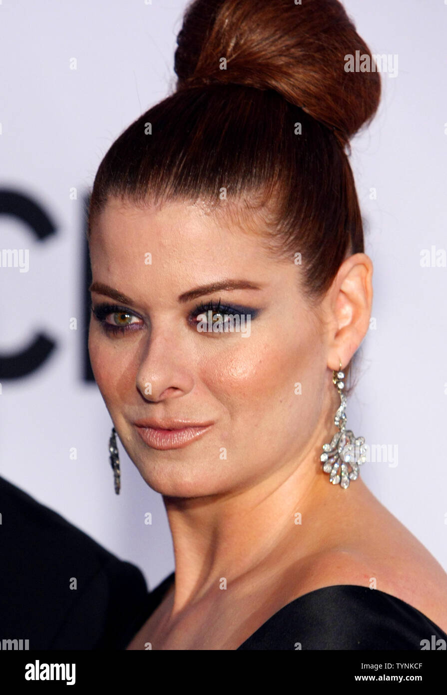 Debra Messing arrives on the red carpet at the 67th Annual Tony Awards ...