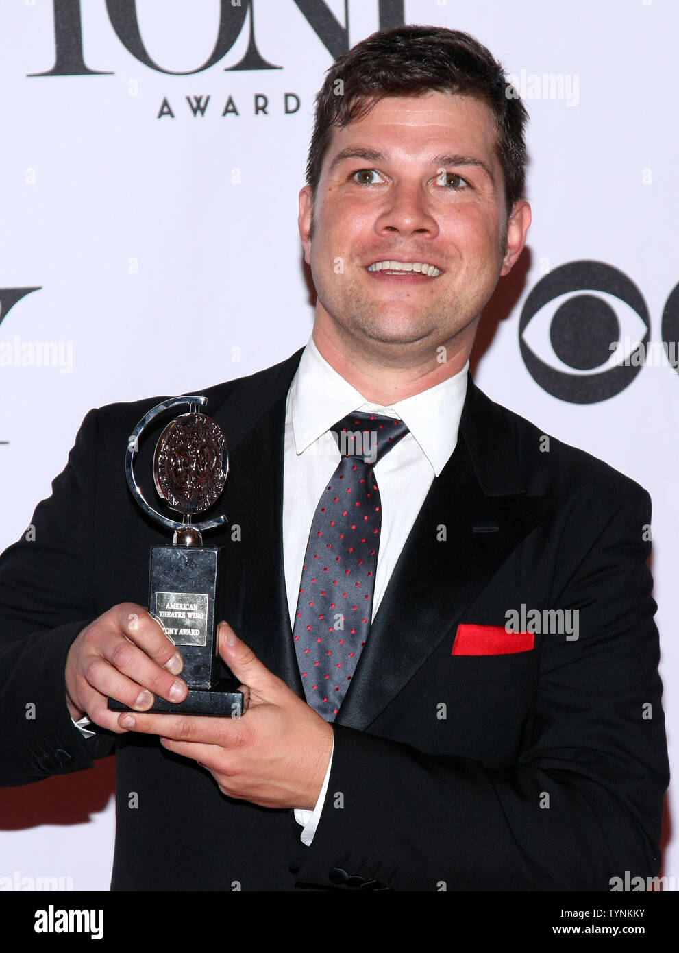 Stephen Oremus arrives in the press room with his Tony Award at the ...