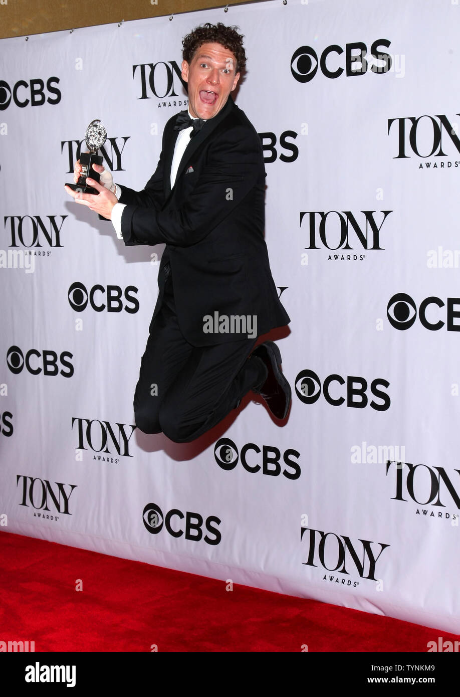 Gabriel Ebert arrives in the press room with his Tony Award at the 67th ...