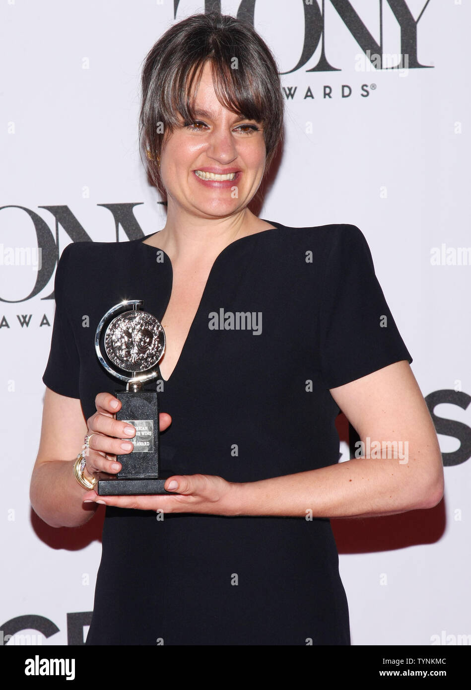 Pam MacKinnon arrives in the press room with her Tony Award at the 67th ...