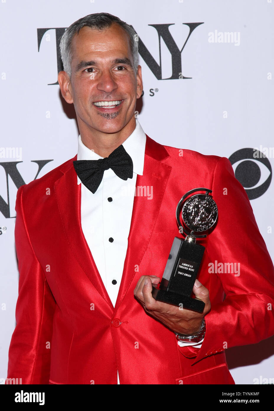 Jerry Mitchell arrives in the press room with his Tony Award at the ...