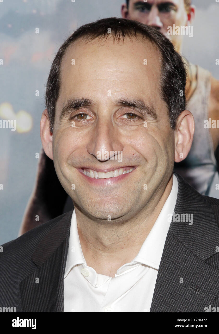 Peter Jacobson arrives on the red carpet at the Premiere of 'White ...