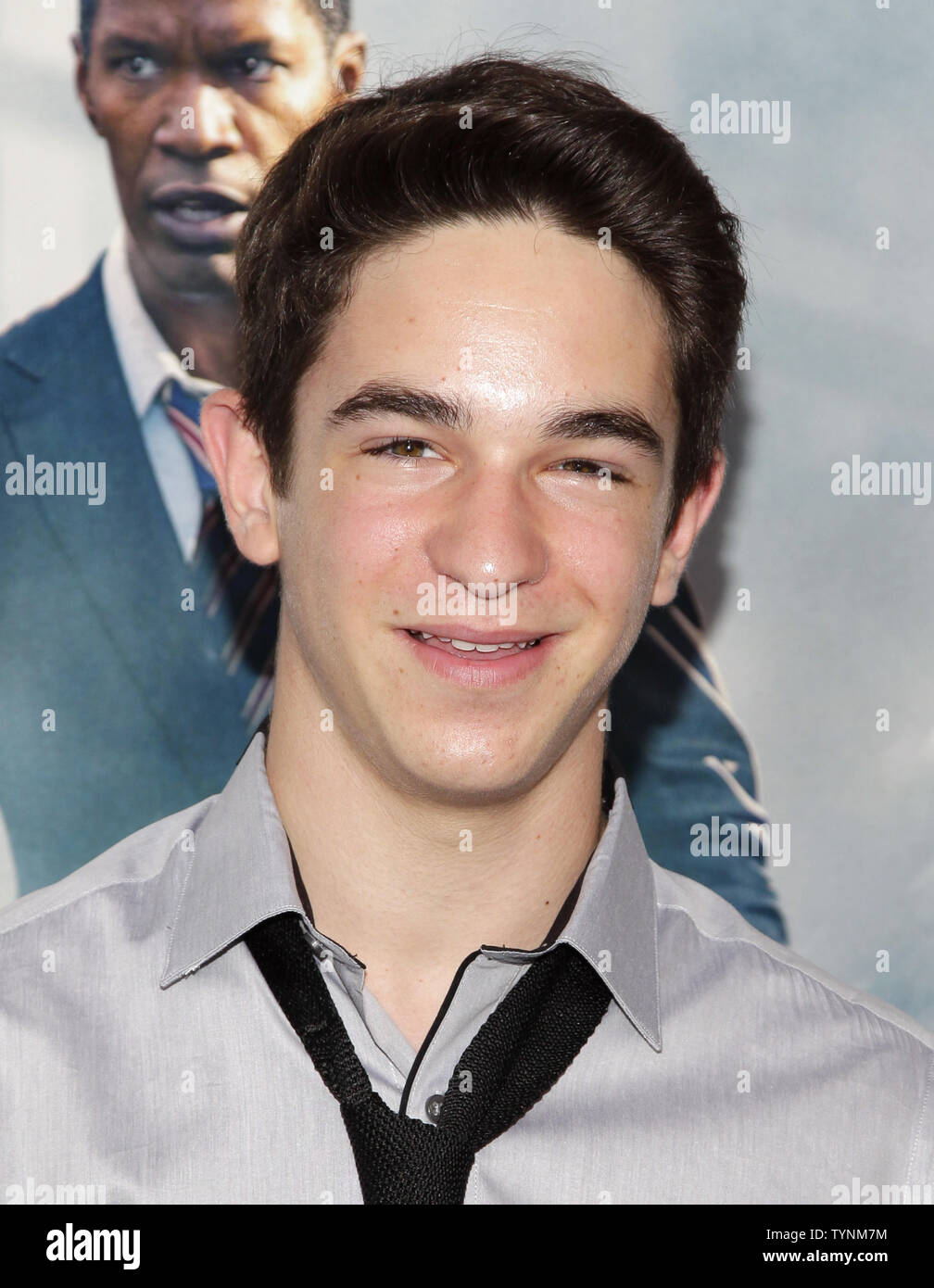 Zack Gordon arrives on the red carpet at the Premiere of 'White House ...