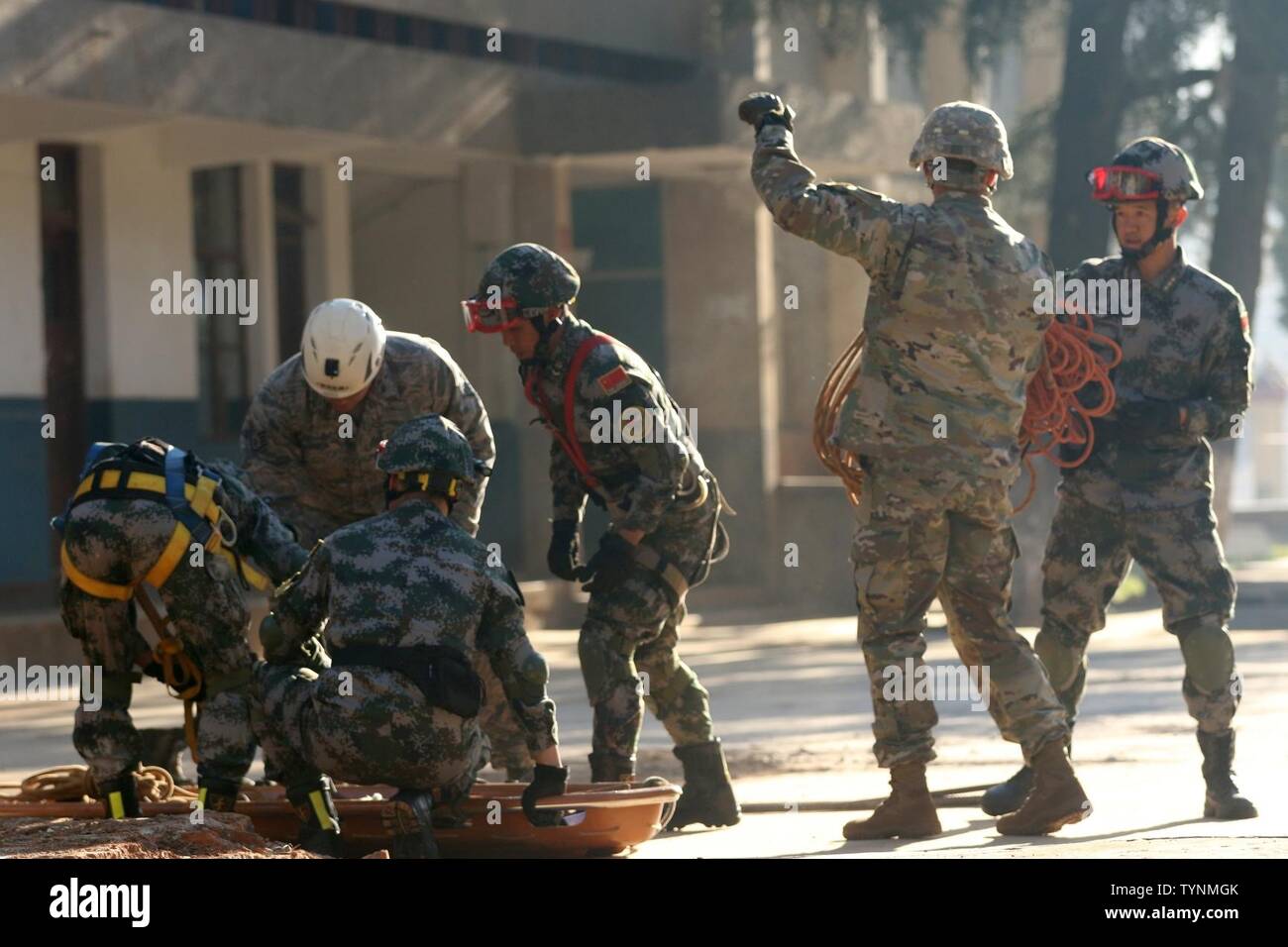 Soldiers from the U.S. Army and the People’s Liberation Army prepare ...