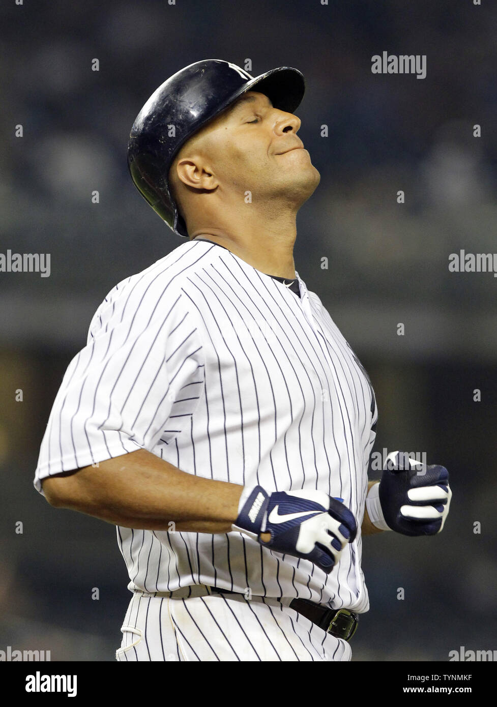 New York Yankees Vernon Wells reacts after grounding out with 2 runners ...