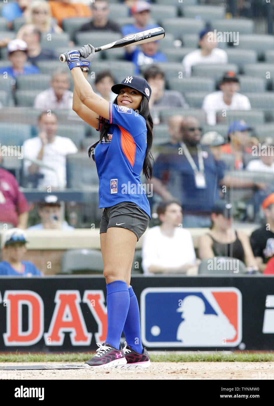 Ashanti stands at the plate at the All-Star Legends & Celebrity ...