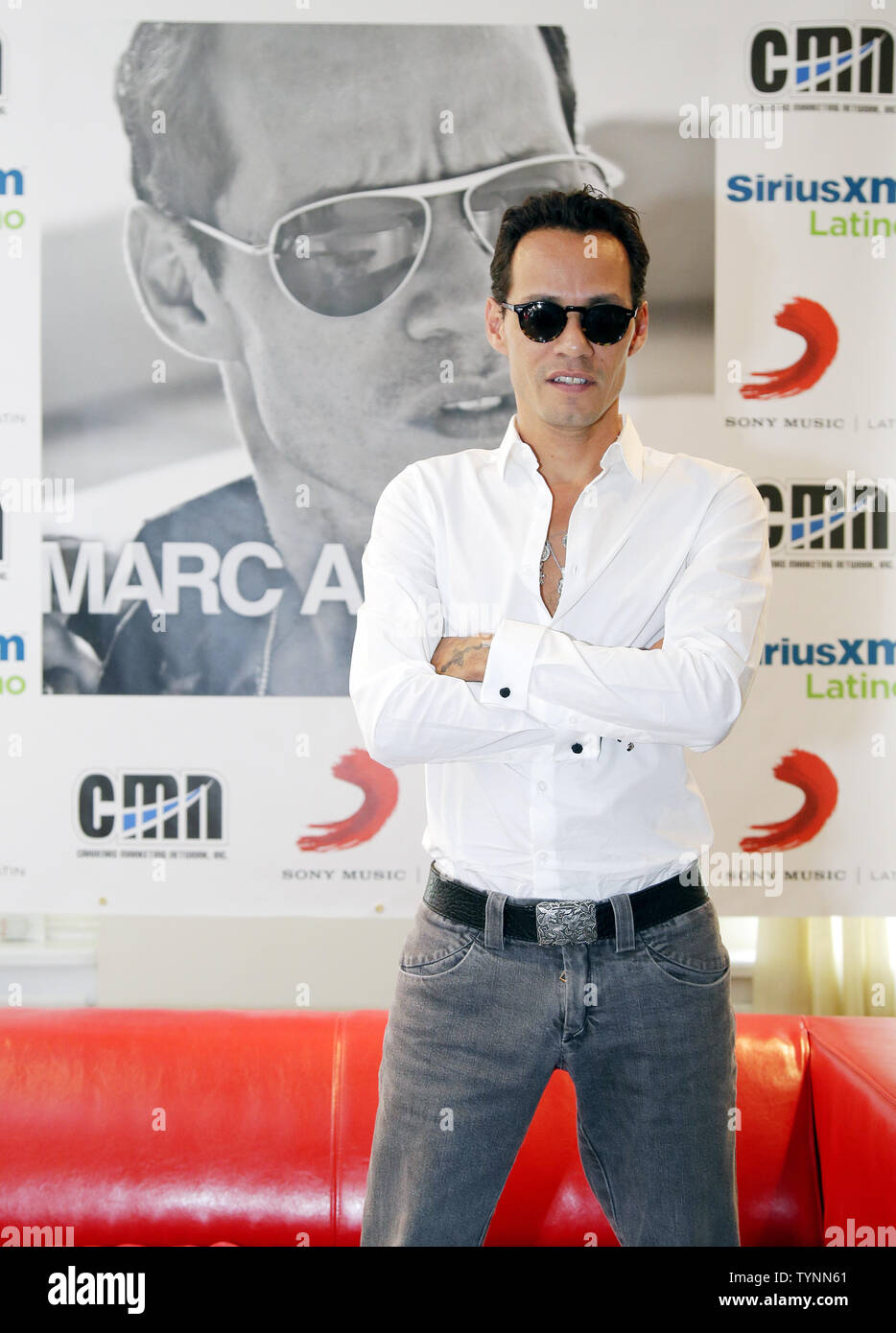 Marc Anthony arrives on the stage before he conducts a listening ...