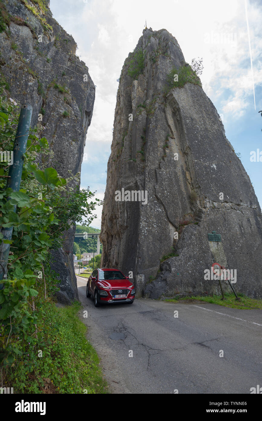 Car driving through Bayard rock in Dinant, Belgium Stock Photo - Alamy