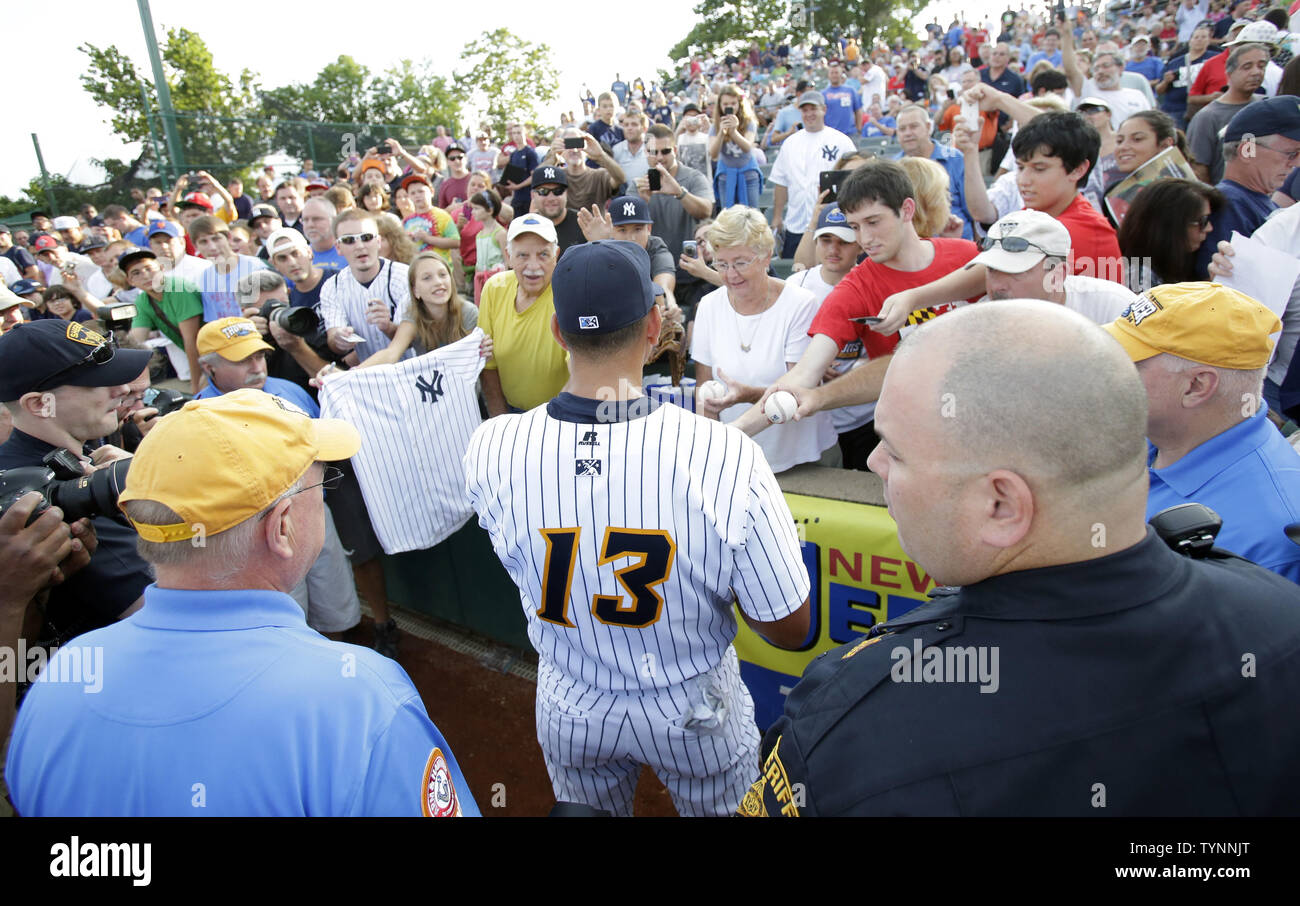 New York Yankees Alex Rodriguez signs autographs for fans before he ...