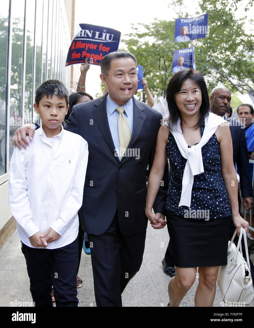 Democratic candidate for mayor of the city of New York, John Liu with wife Jenny and son Joey ...