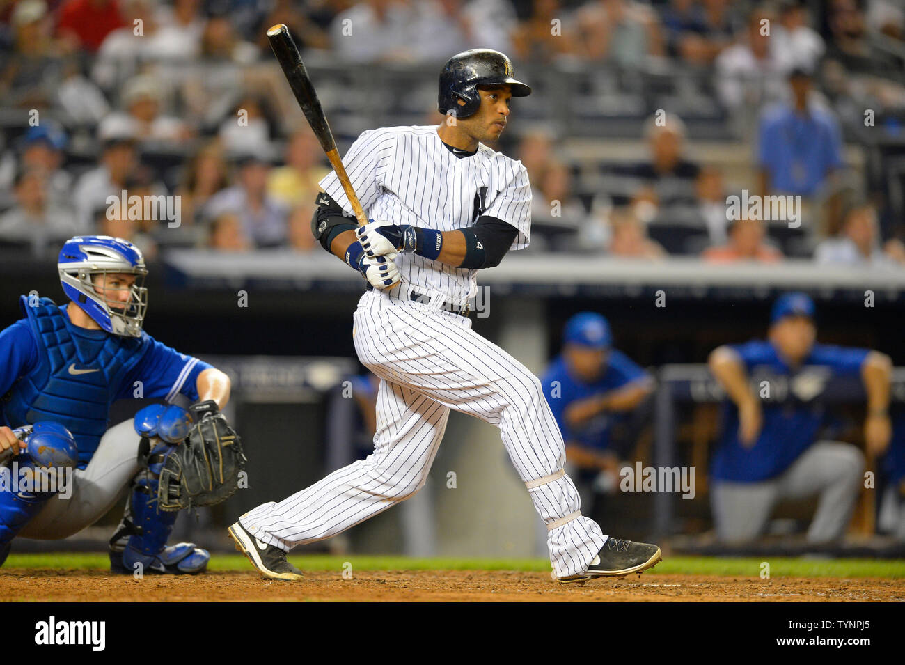 New York Yankees second baseman Robinson Cano (24) singles in the ...