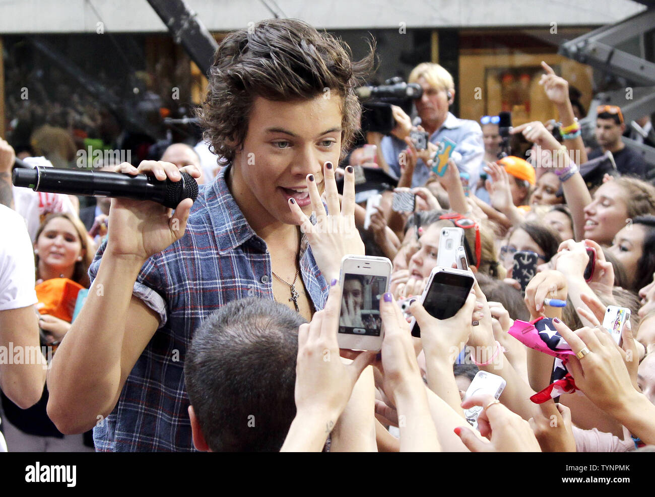 Band member Harry Styles performs with One Direction on the NBC Today ...