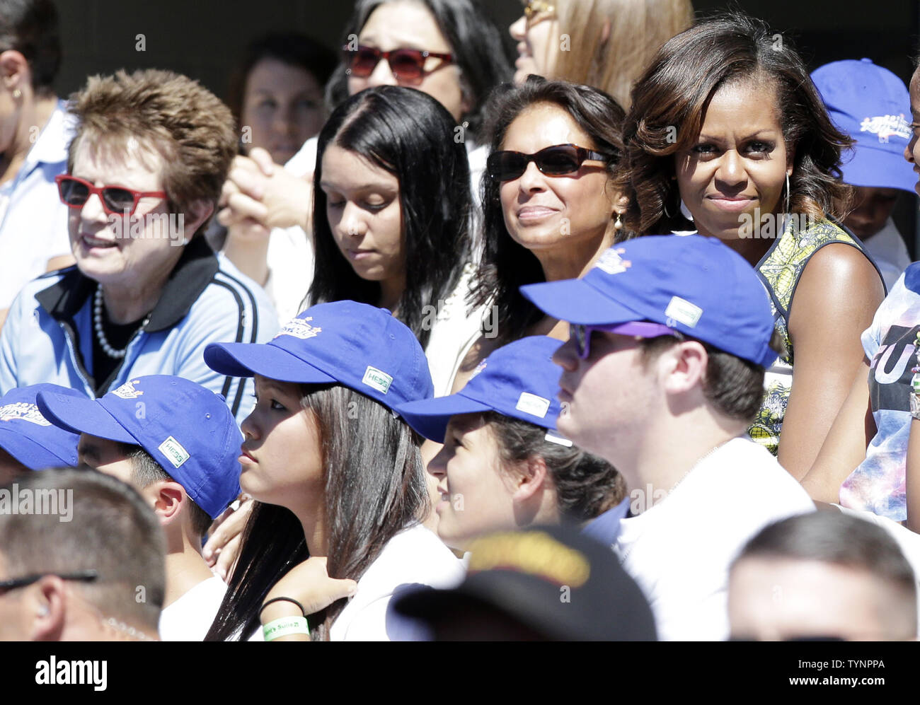 First Lady Michelle Obama and Jeanne Ashe watch the entertainment from ...