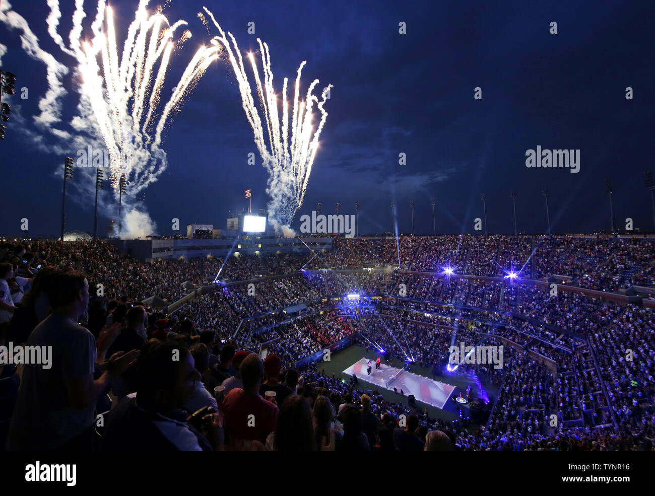 Fireworks go off during the opening night ceremonies at Arthur Ashe ...