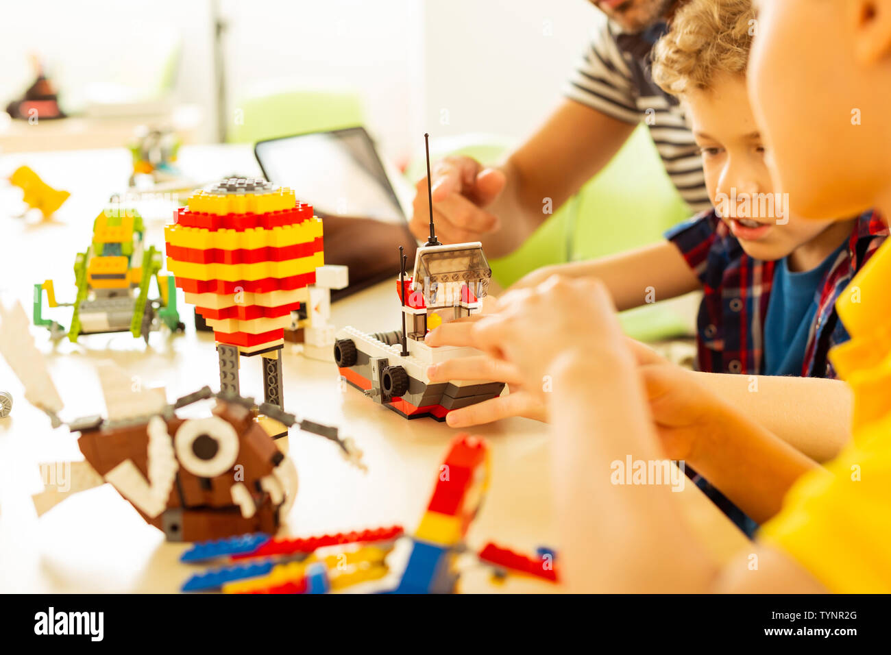 Boys with toy boat hi-res stock photography and images - Alamy