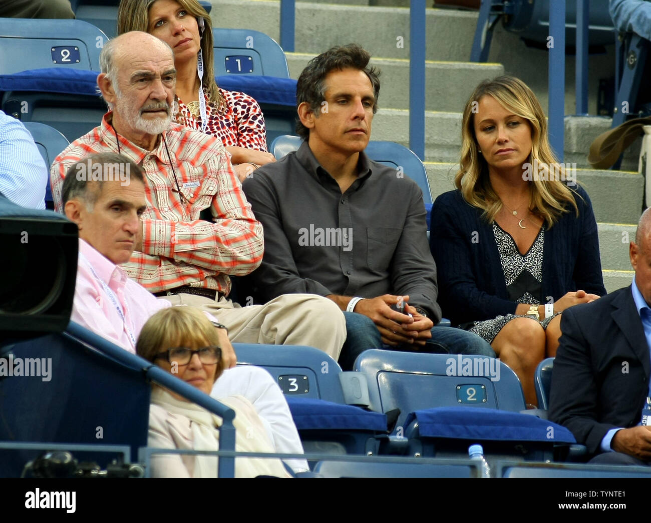 Sean Connery (L) and Ben Stiller watch the men's semifinals match at ...