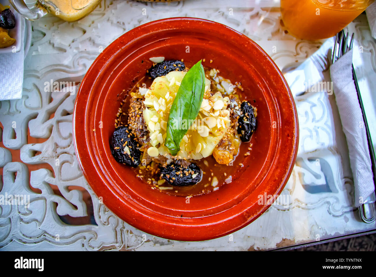 Traditional Moroccan tajin dish. This is meat and some vegatebles or ...