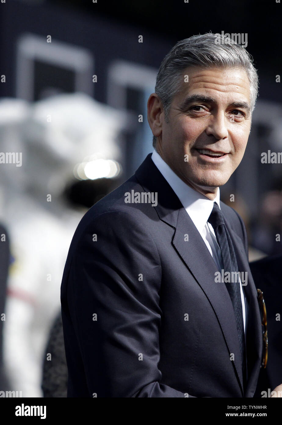 George Clooney arrives on the red carpet at the New York Premiere of ...