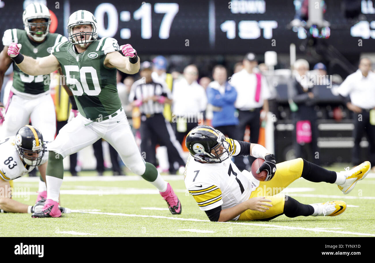 New York Jets Garrett McIntyre reacts after sacking Pittsburgh Steelers ...