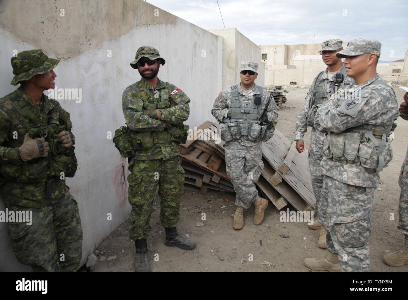 Canadian Master Cpl. Paolo Ortega from The Queen’s Own Rifles, Sgt. Vik ...