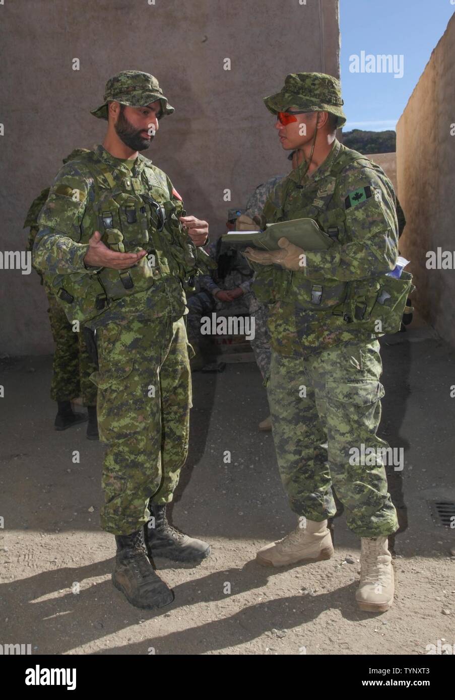 Canadian Army soldiers Sgt. Vik Suagh and Master Cpl. Paolo Ortega ...