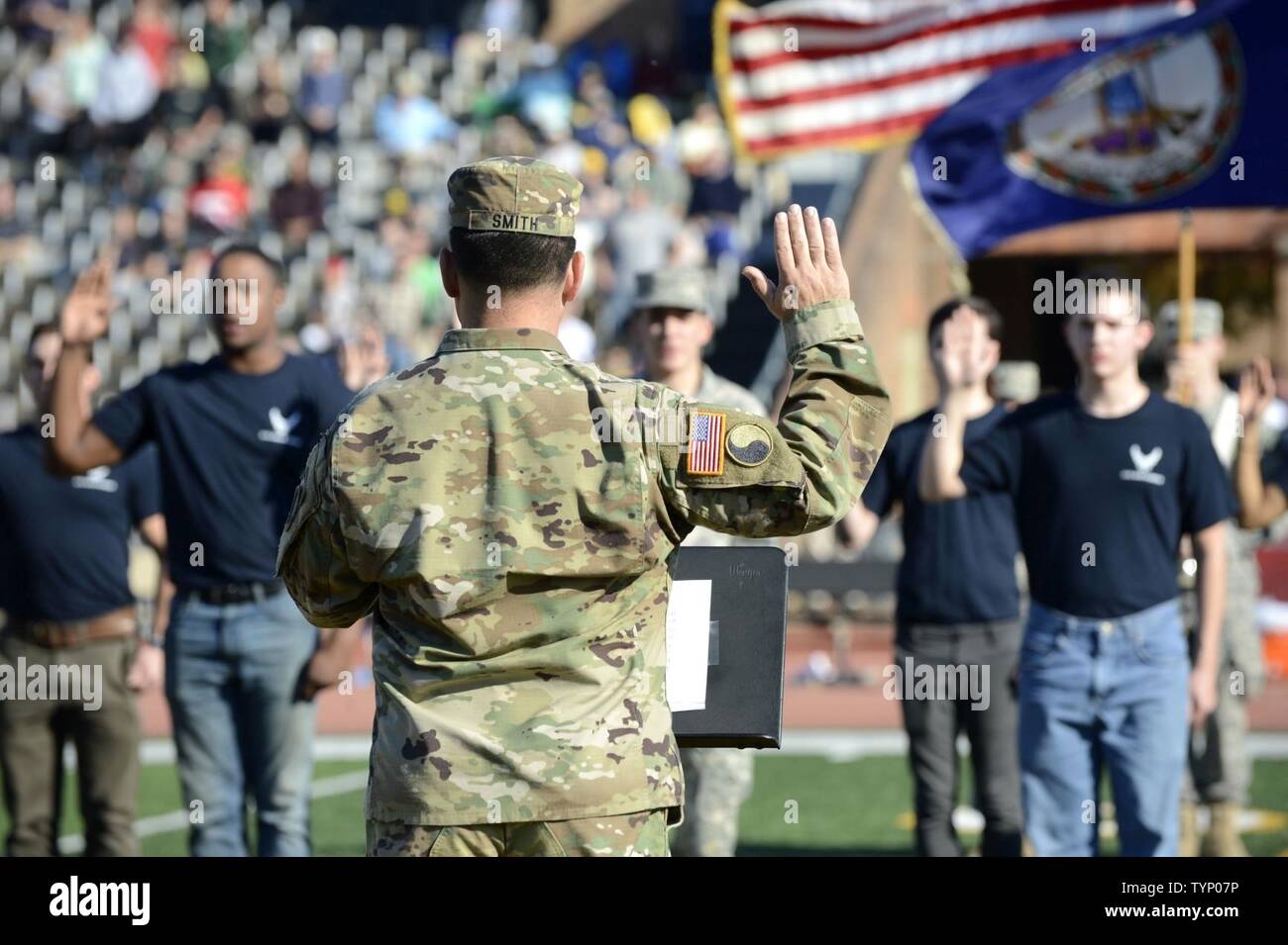 U.S. Army Col. Scott Smith, Virginia National Guard commander, recites ...