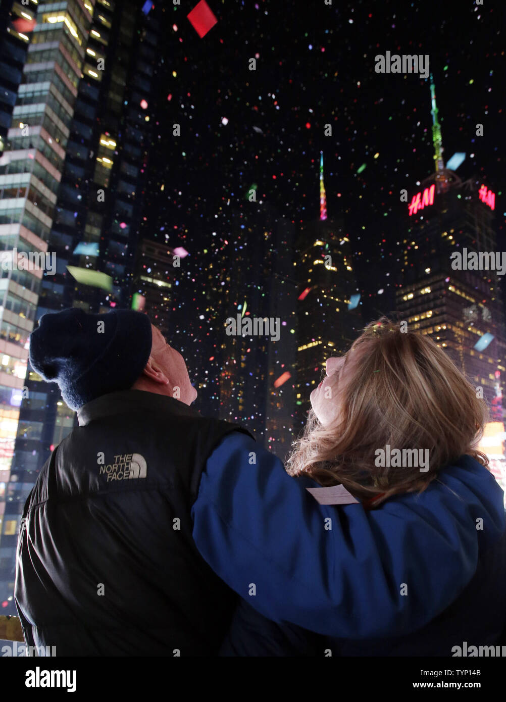 Anna Edgerly-Moore and Ken Magowan watch the confetti at the Marriott ...