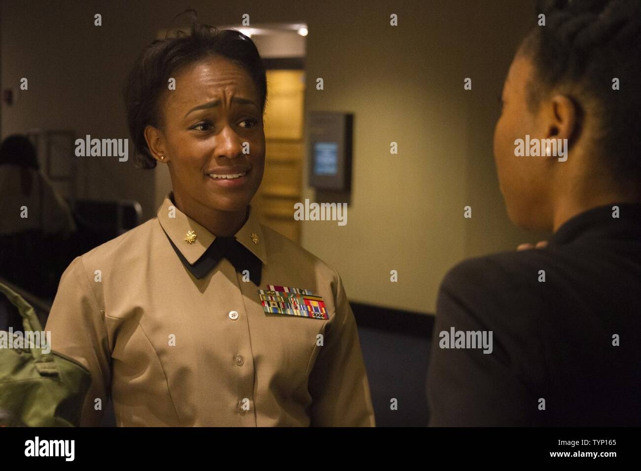 Major Marshalee E. Clarke speaks to a student after the Sister-to ...