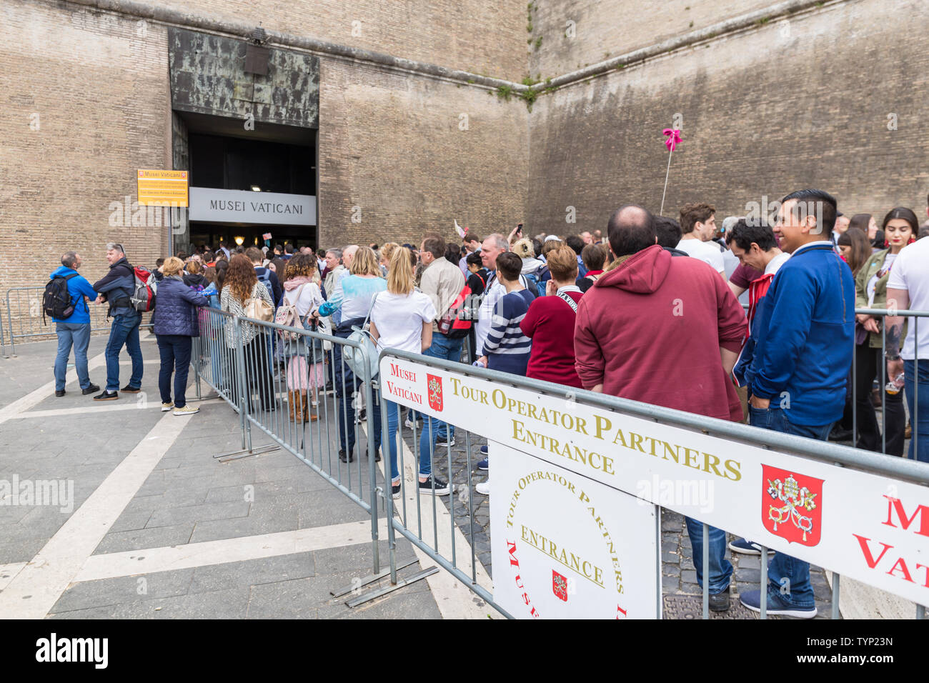 ROME, ITALY - APRIL 23, 2019: Crowds of tourists wait at the entrance ...
