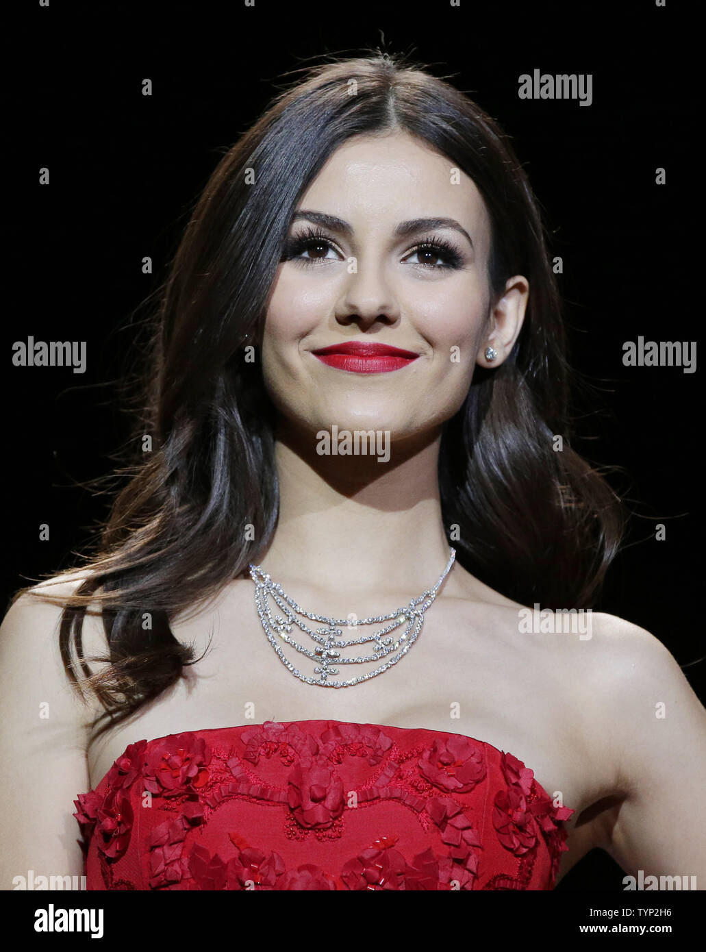 Victoria Justice walks on the runway in The Heart Truth Red Dress ...