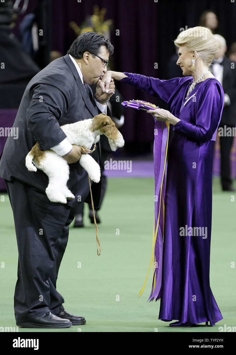Handler Gabriel Rangel kisses the hand of judge Betty Regina Leininger ...